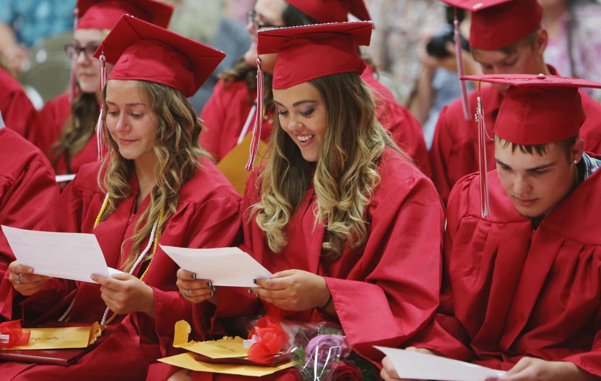 School gives scholarships to last graduating class