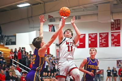 Mt. Zion escaped Lincoln in sectional semifinal