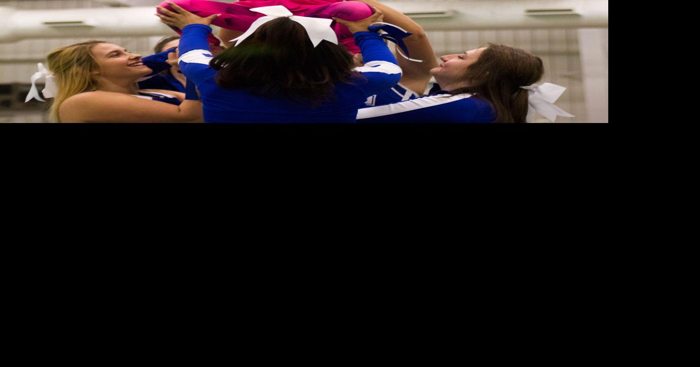 Millikin cheerleaders cheer on students