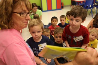 Curious George leads animal-themed children's museum camp