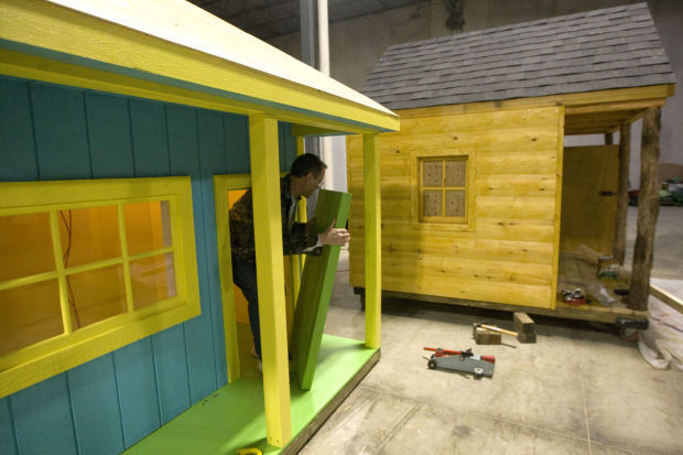 CASA Playhouse Raffle features log cabin, beach house