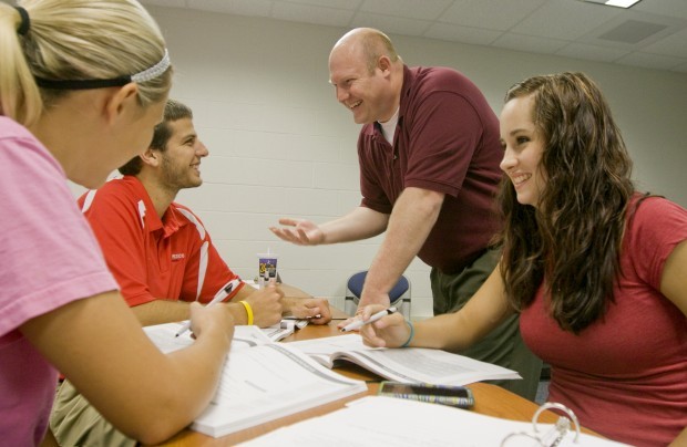 High school graduates take class in avoiding the credit trap
