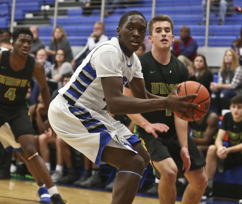 PHOTOS: MacArthur wins 65-63 over Normal U-High in Boys Basketball Action