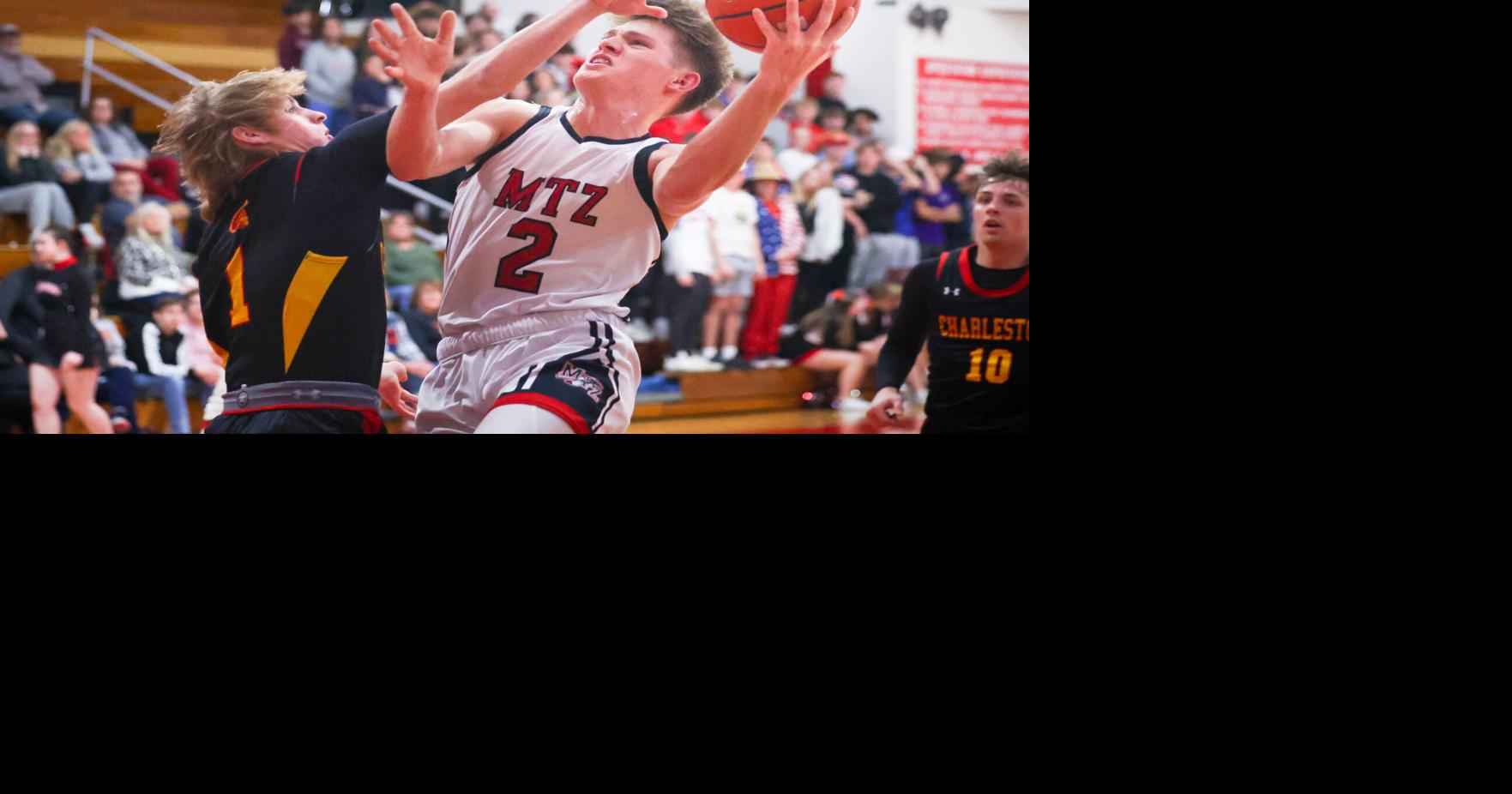 Photos: Mt. Zion boys basketball hosts Charleston