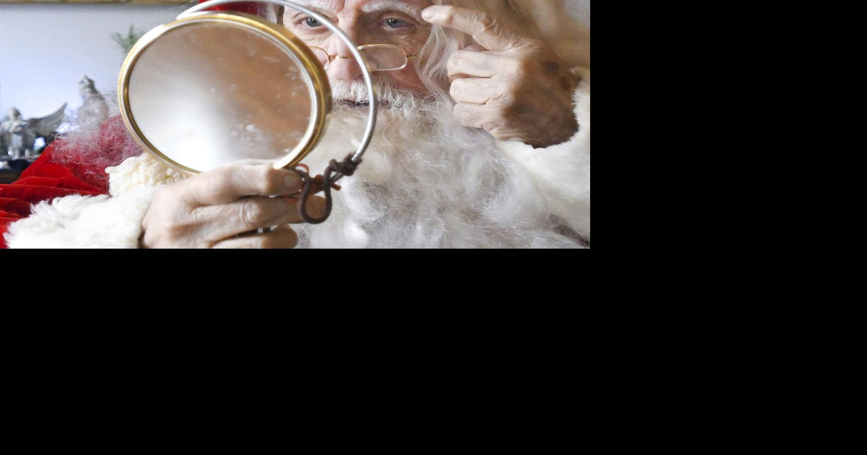 Forsyth man has Santa suit, and the spirit to match