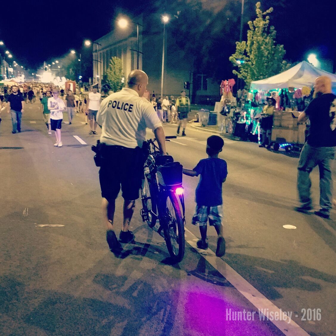 Behind the Photo: Police officer and boy at Decatur Celebration