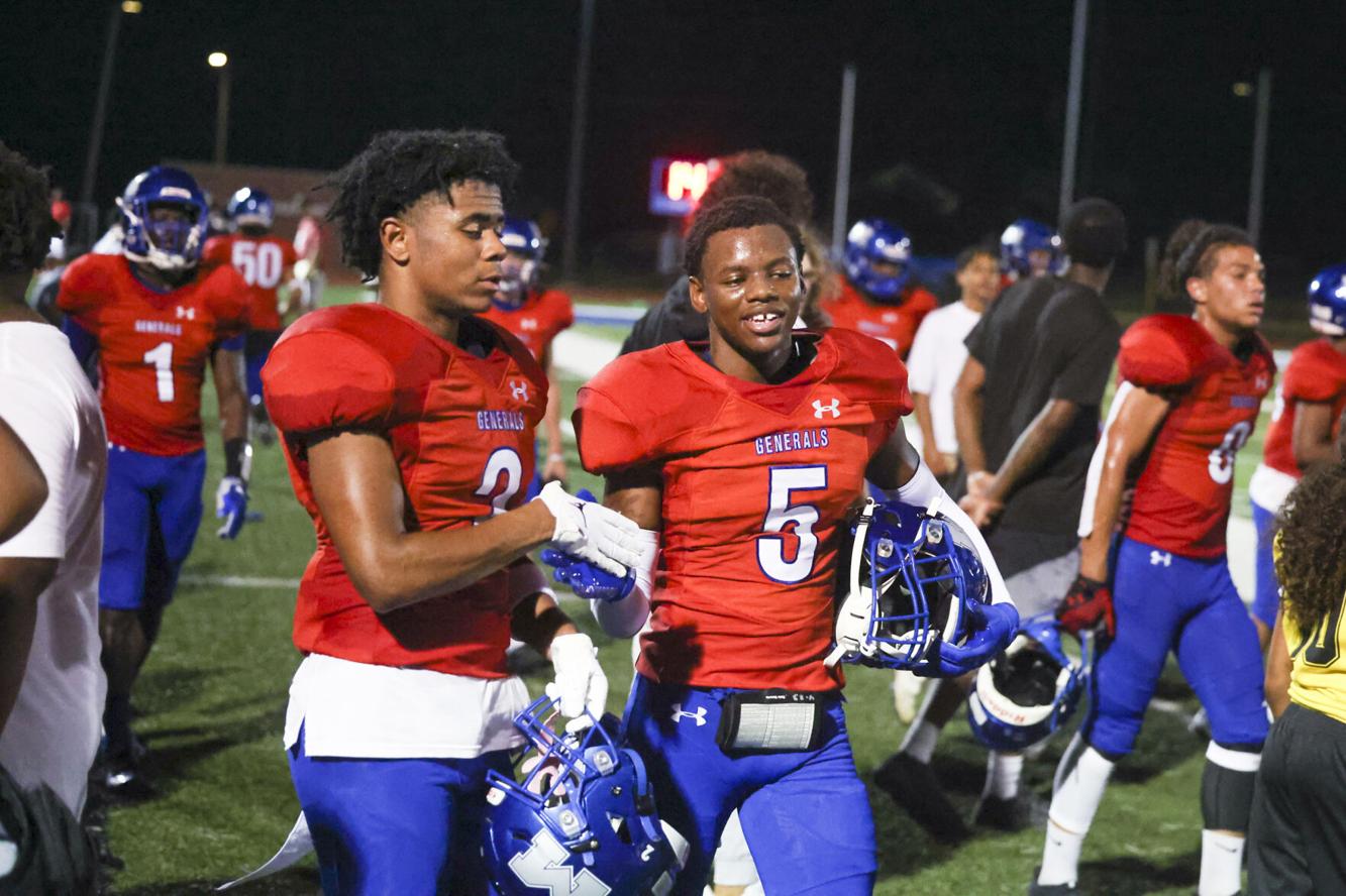 MacArthur freshman Myson Johnson-Cook supported by family