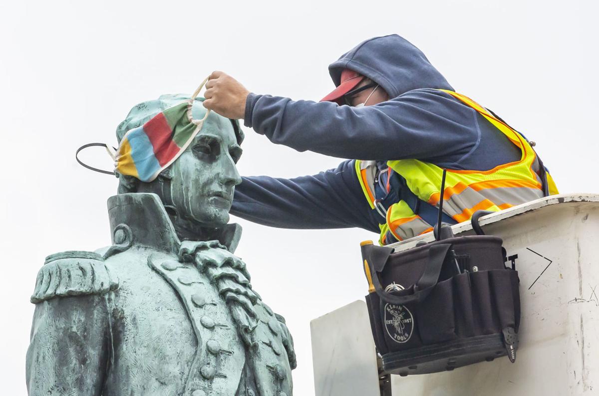 Downtown Decatur statues mask up as show of support for frontline workers
