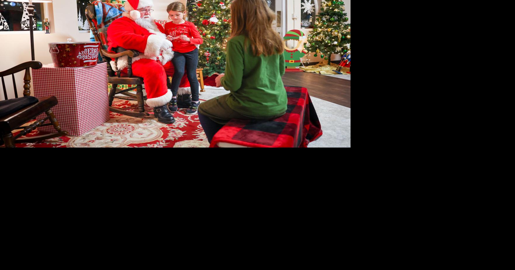 Santa arriving in Macon County by helicopter and CAT truck on Saturday