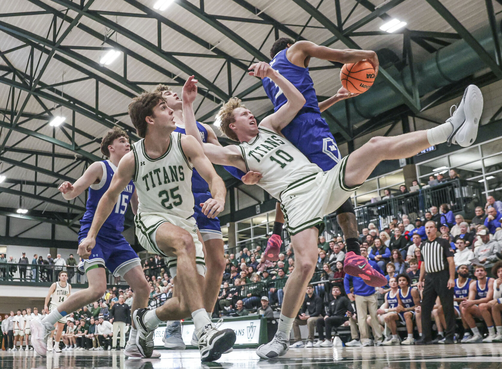 Photos: Illinois Wesleyan downs Millikin 72-62 in Shirk Center showdown