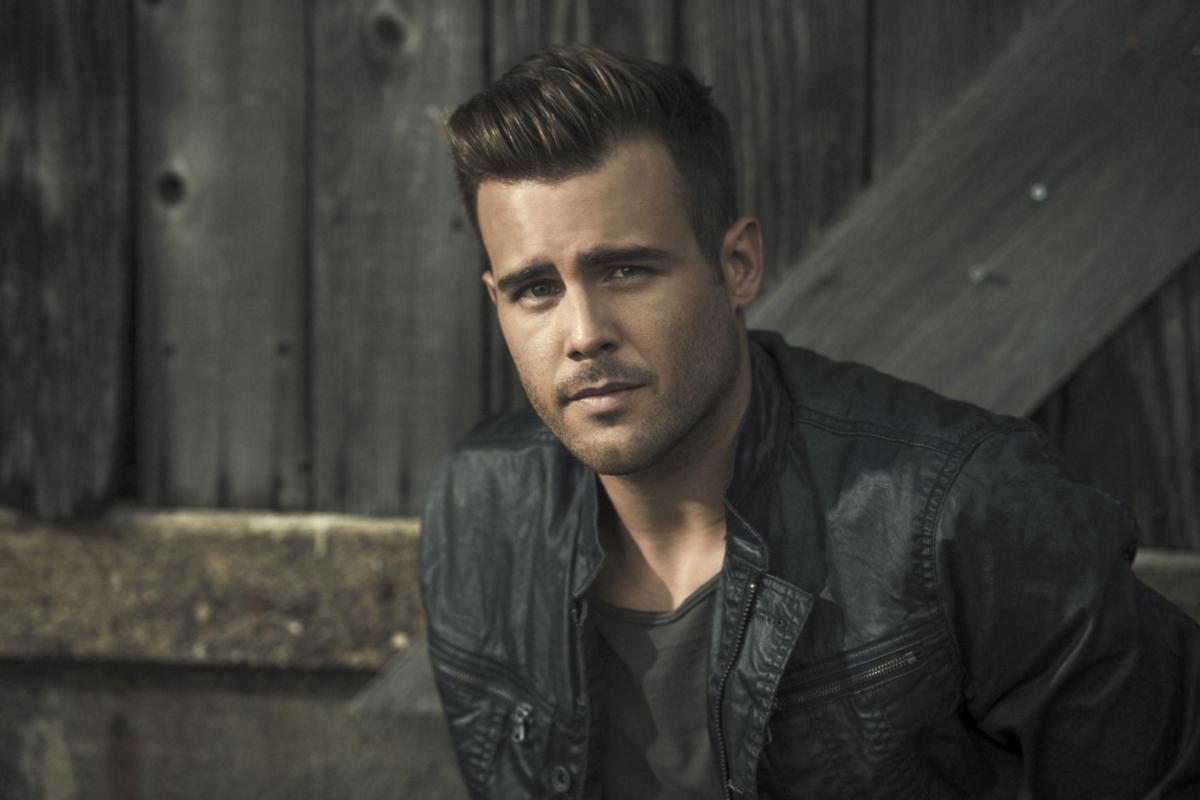 Country musician Jackie Lee performing at Shake the Lake