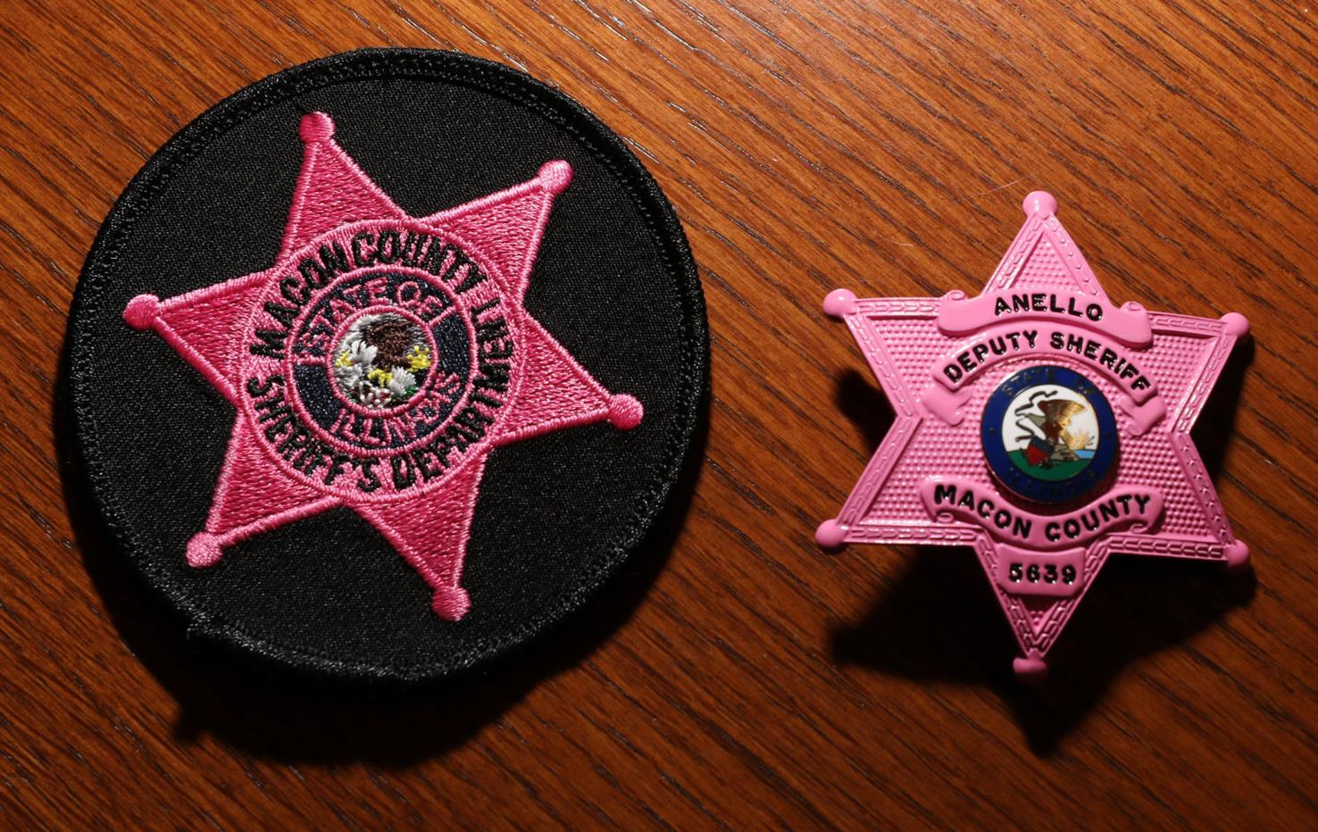 Sheriff's deputies' pink badges shine for Breast Cancer Awareness Month