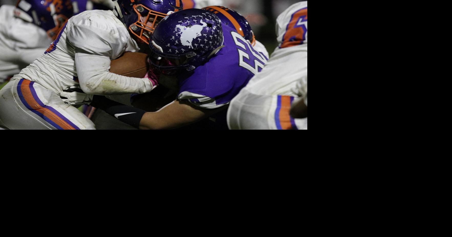 PHOTOS: Tri-County Titans fall to the Arcola Purple Riders 62-20