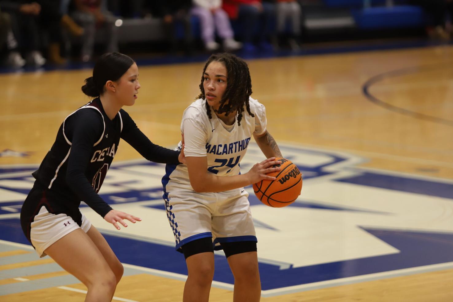 Photos: MacArthur girls basketball defeats Champaign Central