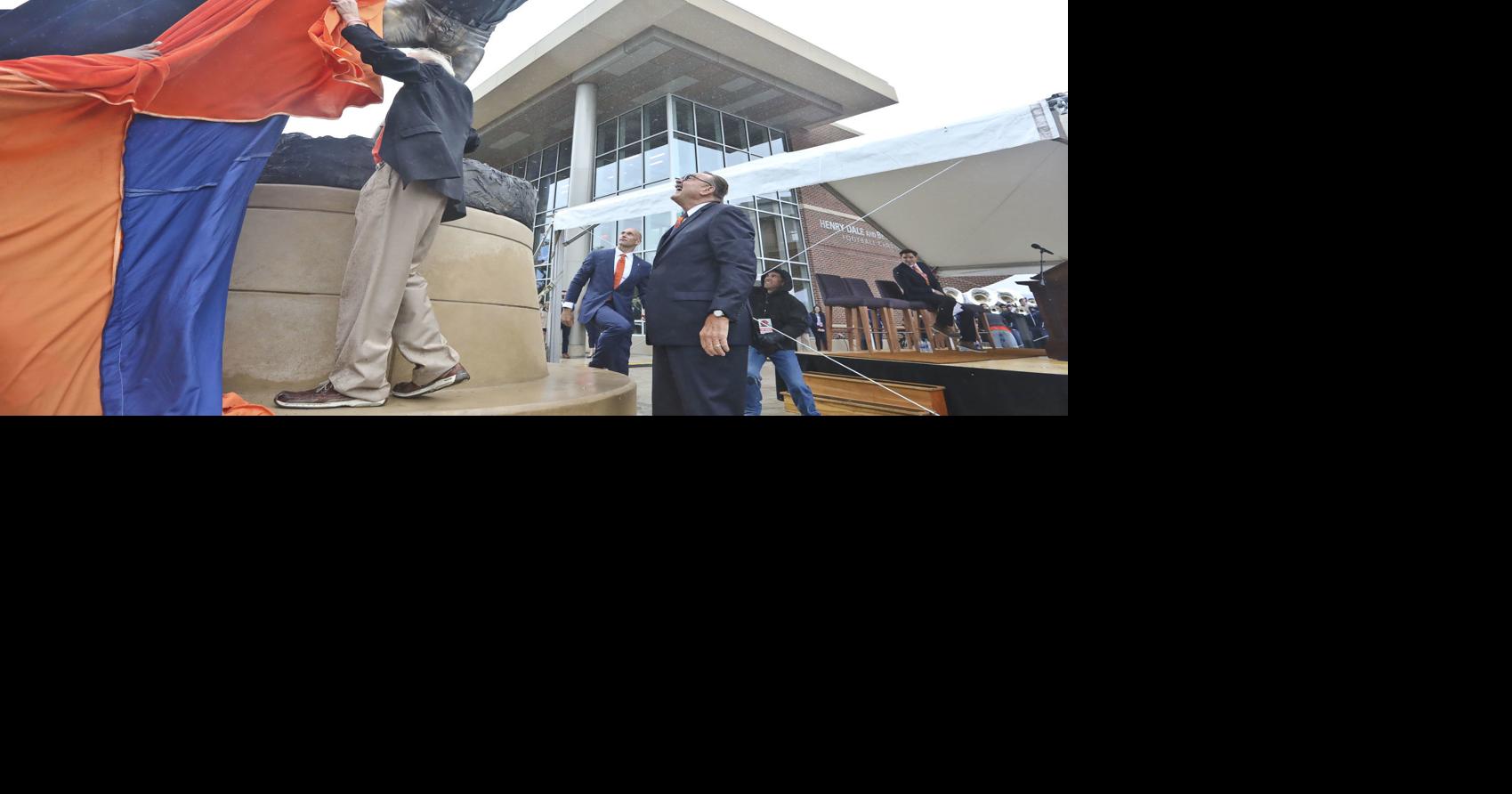 Dick Butkus statue unveiled outside Henry Dale and Betty Smith Football ...