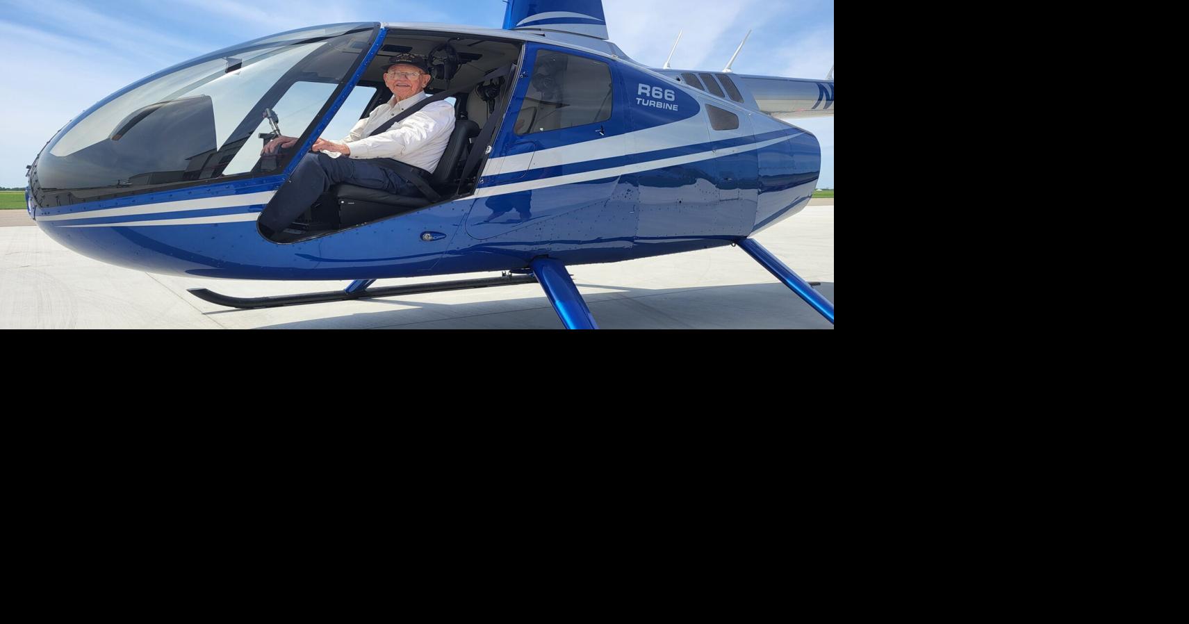 WW II vet flies in helicopter for Memorial Day wreath drop
