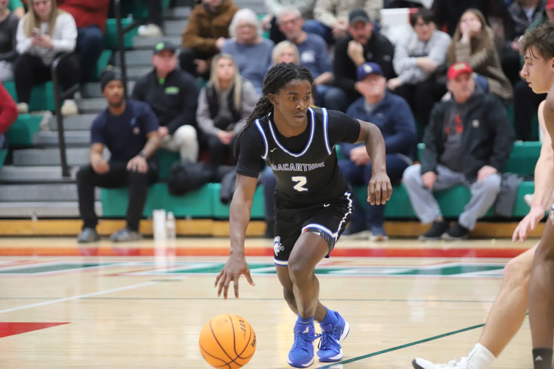 Photos: MacArthur defeats Lincoln boys basketball for eighth straight win
