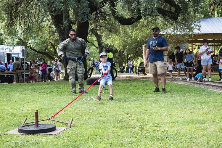 PEDALS AND PATROL: NBPD gives away bikes and scooters to local children ...