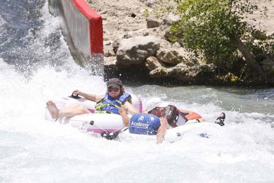 Wristband could let visitors bypass the tube chute on the Comal River ...
