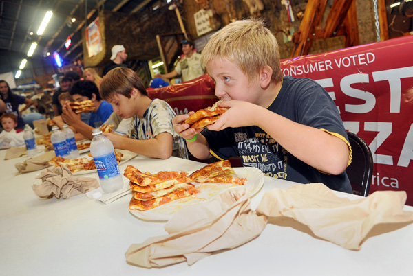 Rodriguez wolfs down 6 slices in 15 minutes to claim pizza eating ...
