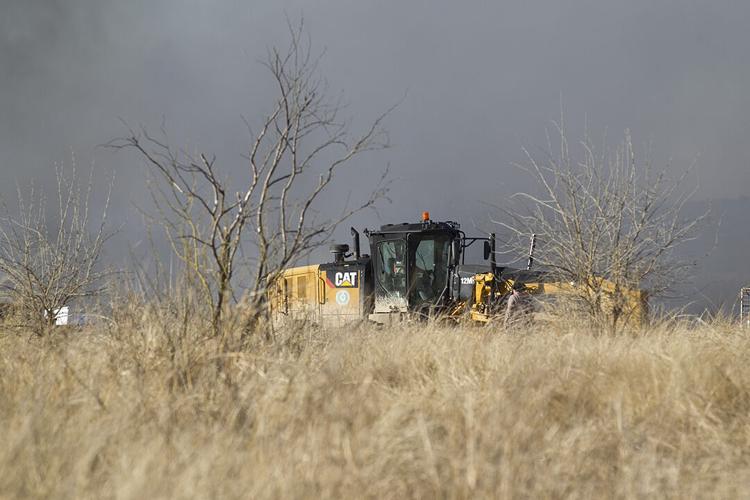 Firefighters extinguish large grass fire near Comal-Hays county line ...