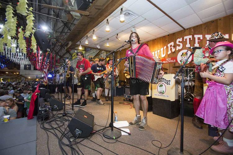 The music man: Meixner keeps Wurstfest dancing with traditional tunes ...