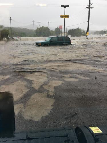 Heavy rains prompt flash flooding, minor river flood warning ...