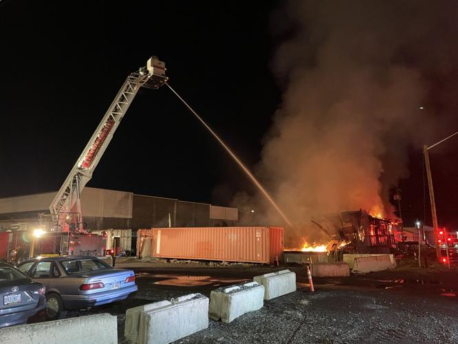 Commercial structure fire injures one, destroys warehouse, vehicles in ...