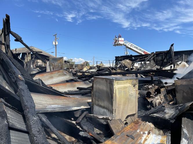 Commercial structure fire injures one, destroys warehouse, vehicles in ...