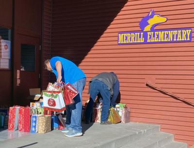 Malin church donates Christmas gifts to more than 400 area students ...