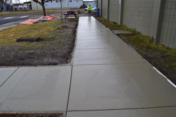 Eagle Ridge and Ponderosa students construct sidewalk with donated ...