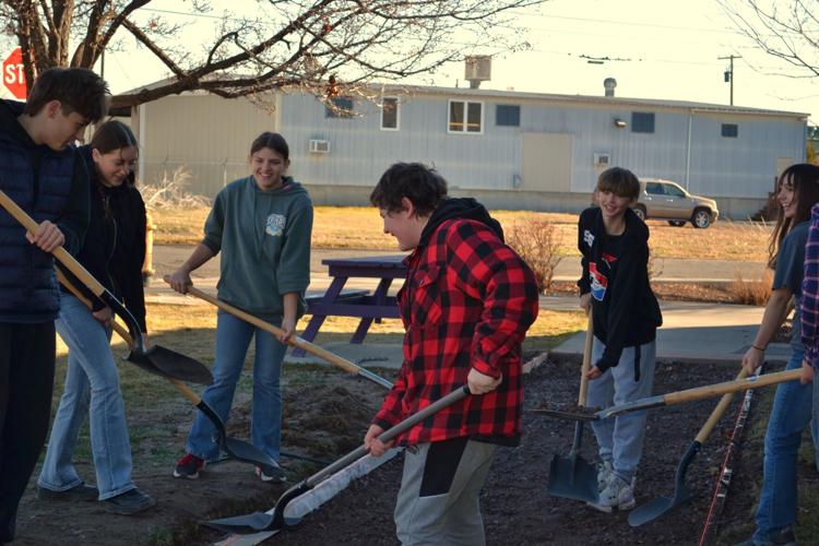 Eagle Ridge and Ponderosa students construct sidewalk with donated ...