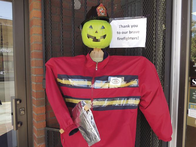 Trick or treaters collect candy in downtown Klamath Falls for Scarecrow ...