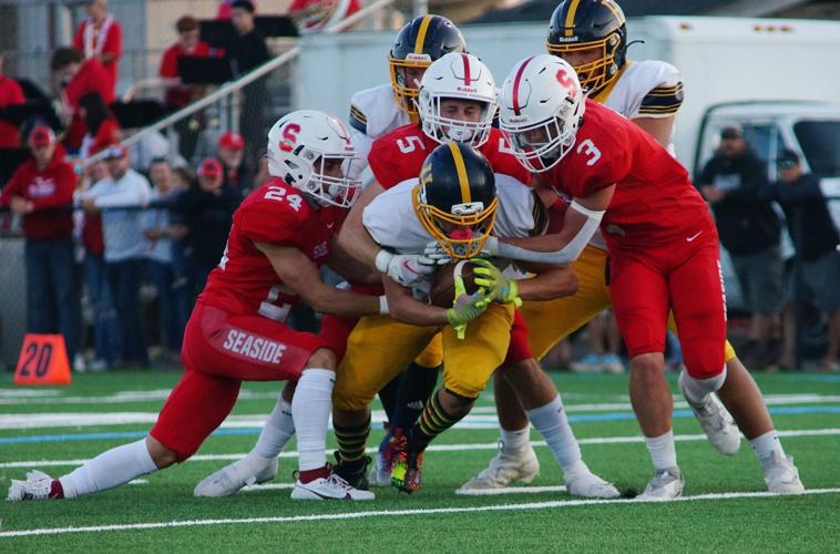 Prep football: Henley makes another trip to Seaside, comes away with ...