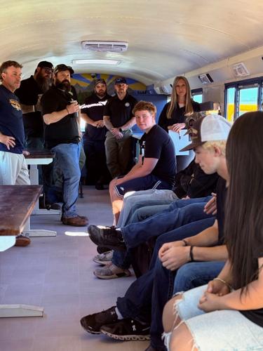 Henley high school students retrofit bus to serve as mobile fire ...