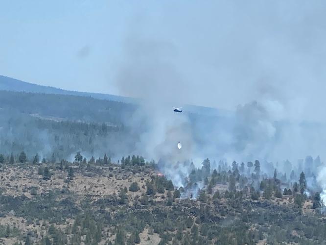 Bly Mountain fire evacuation level reduced; dangerous weather ...