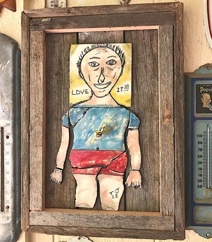 Greenville artist uses ceramics and wooden fencing in colorful original ...