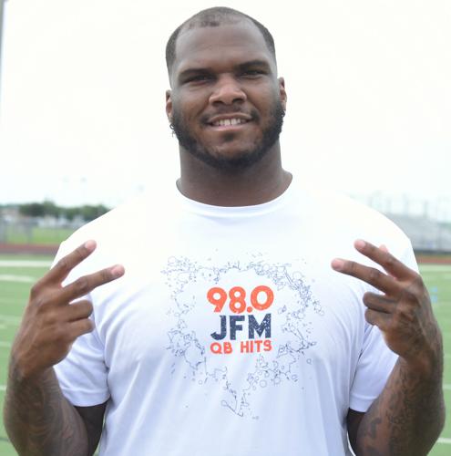 Pro football player John Franklin-Myers conducts football camp in ...