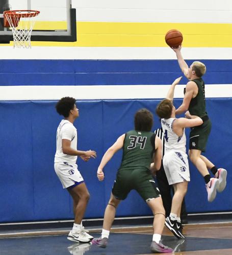 Basketball roundup: Boles falls in tourney finals; Leonard wins own ...