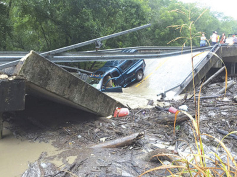 Flood waters close major highways, collapse bridge | News ...