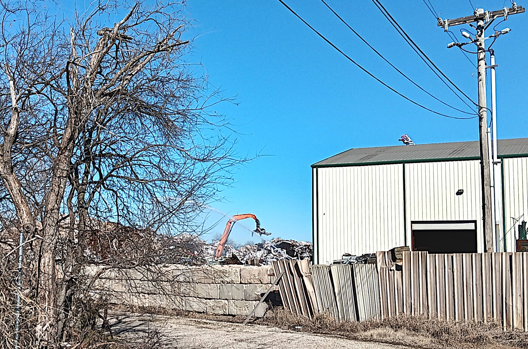 Greenville and L3Harris fire departments work together on scrap yard ...