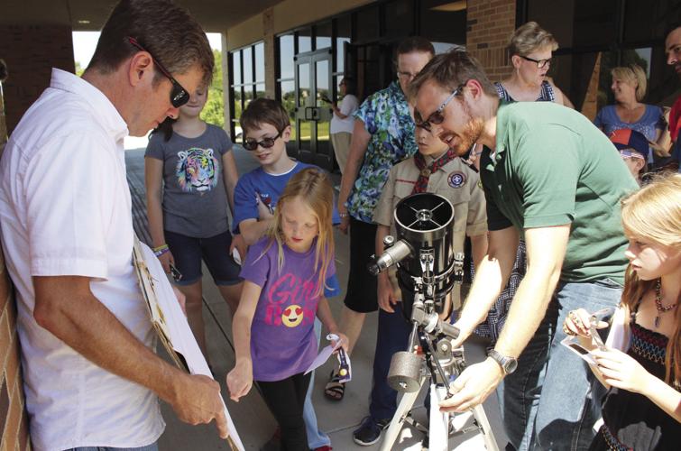 Hunt County residents look to the skies during eclipse | News ...