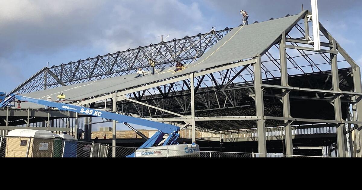 Working on a new church roof | News | heraldbanner.com