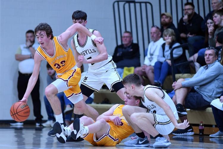 PHOTOS: Alexandria wins heated matchup against CIC rival Madison-Grant ...