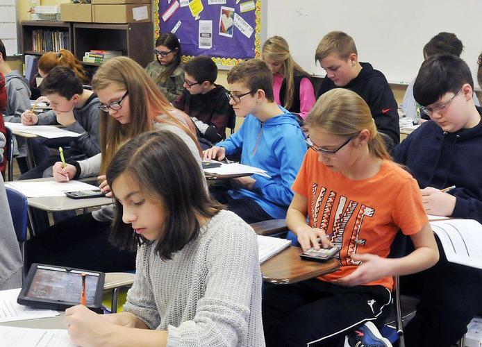 Alexandria sixth-grader Lukas Sullivan takes pre-algebra at junior high ...