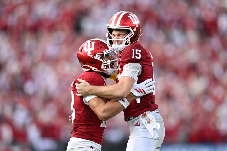 Strong ground games propel No. 1 Indiana and No. 5 Oregon to CFP ...