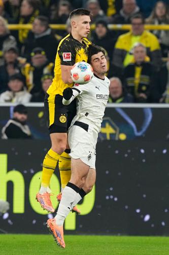 Dortmund up to second in Bundesliga after comfortable win over ...