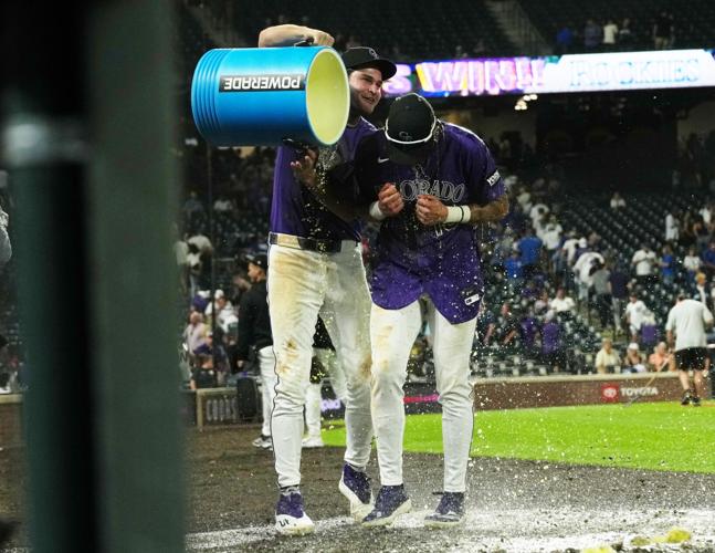Cole Carrigg triples in Rockies debut and plays with his `hair on fire ...