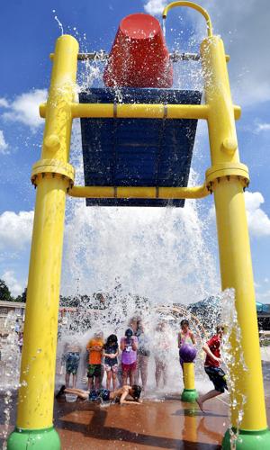 Splash pads offer inexpensive relief from blistering heatwave | News ...