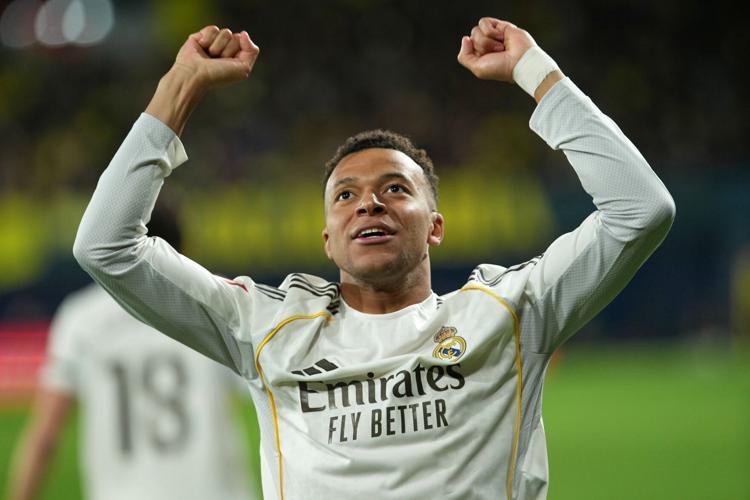 Mbappé's brace at Villarreal lifts Real Madrid into La Liga lead ...